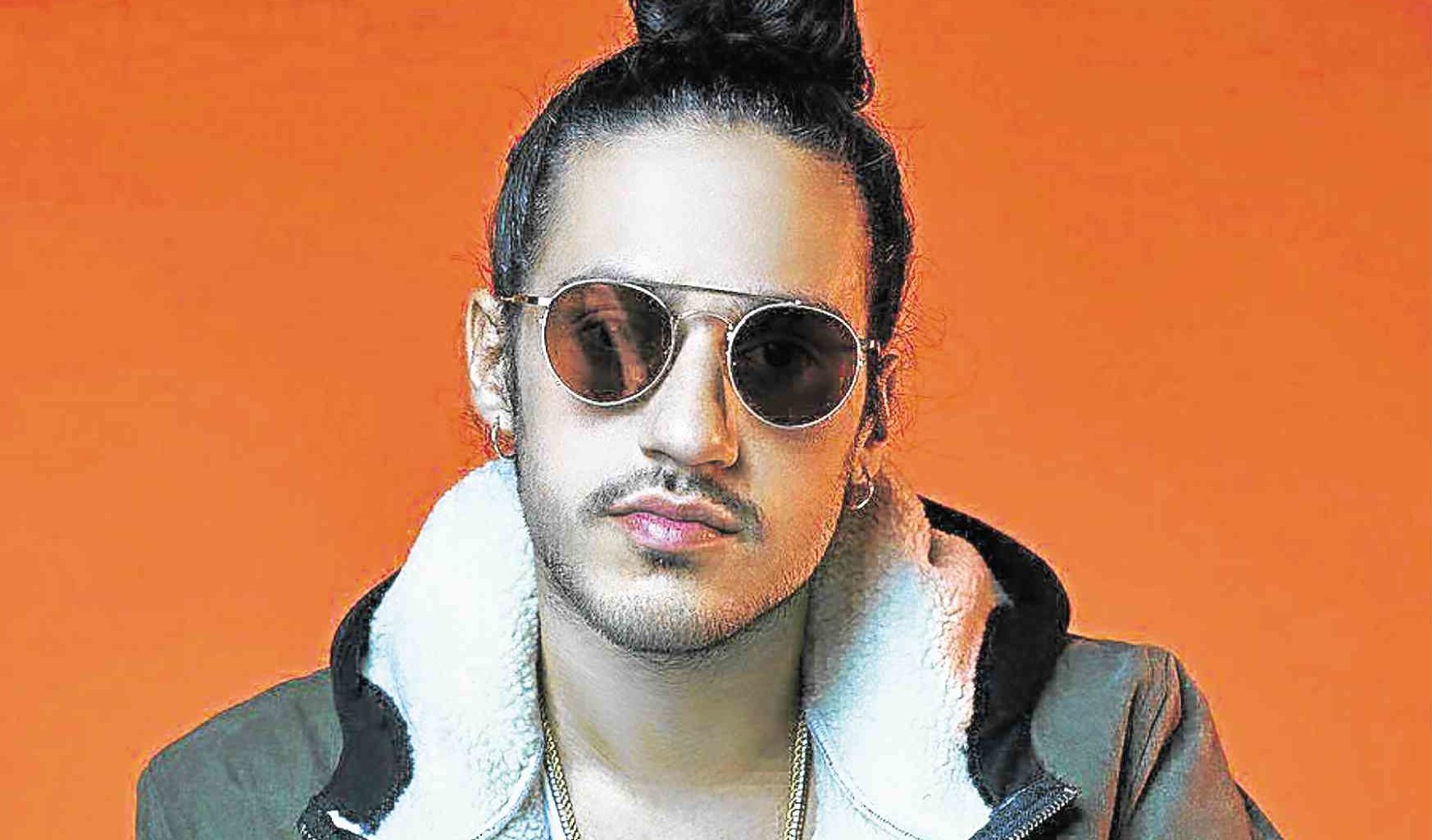 Despite being bruised and missing a ring, rapper Russ loved his 1st ...