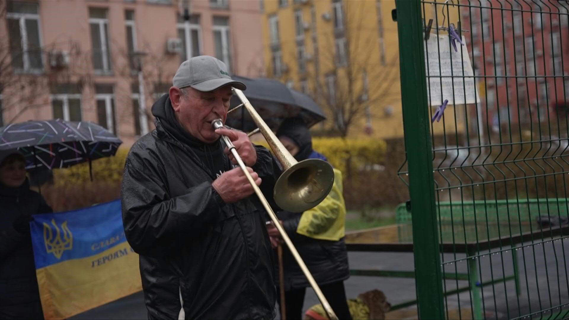 Musician Valentyn Dudkin, 80, vows to play trombone in Kyiv 'until we ...